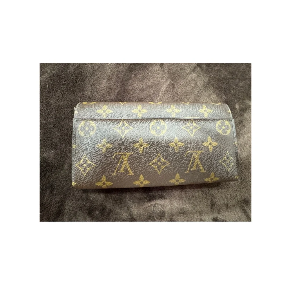 Louis Vuitton | Bags | Louis Vuitton Monogram Leather Wallet With Bold ...